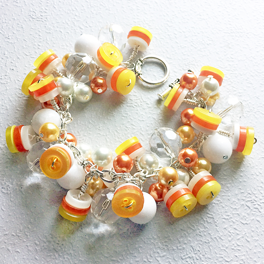 Learn How to Make a Candy Corn Bracelet with Buttons!